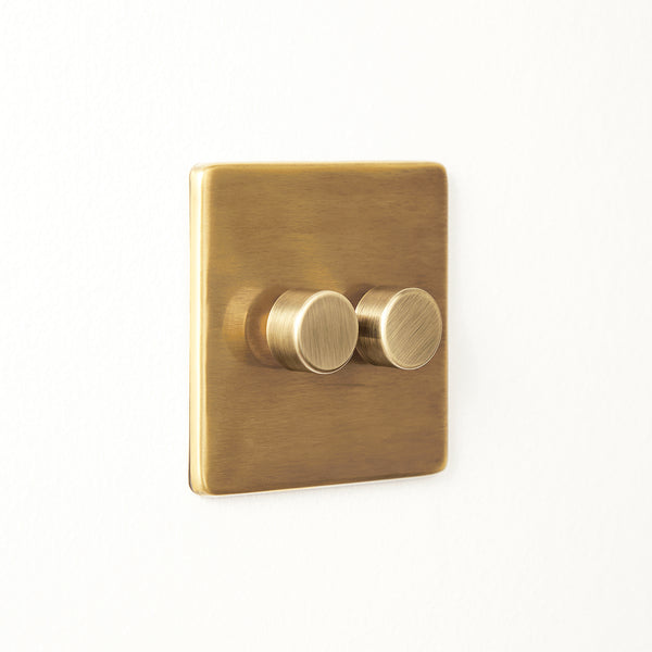 Two gang 2 way Florence dimmer switch in brass