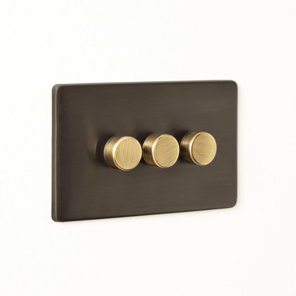 Three gang 2 way Florence dimmer switch in bronze