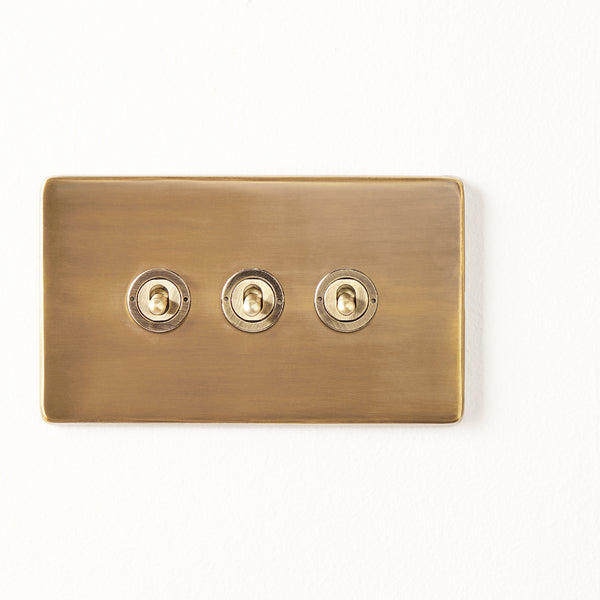Three gang 2 way Florence toggle switch in brass