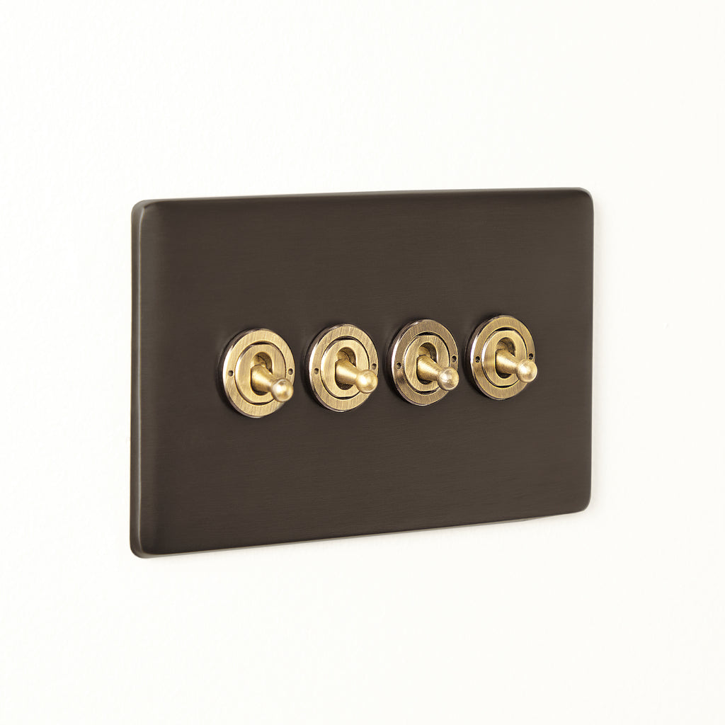 Four gang 2 way Florence toggle switch in bronze