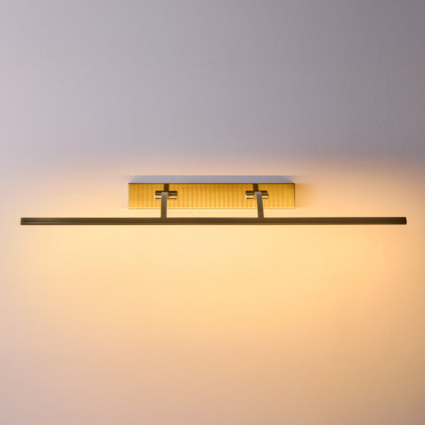 Dimmable Larger Blake picture light in antique brass finish