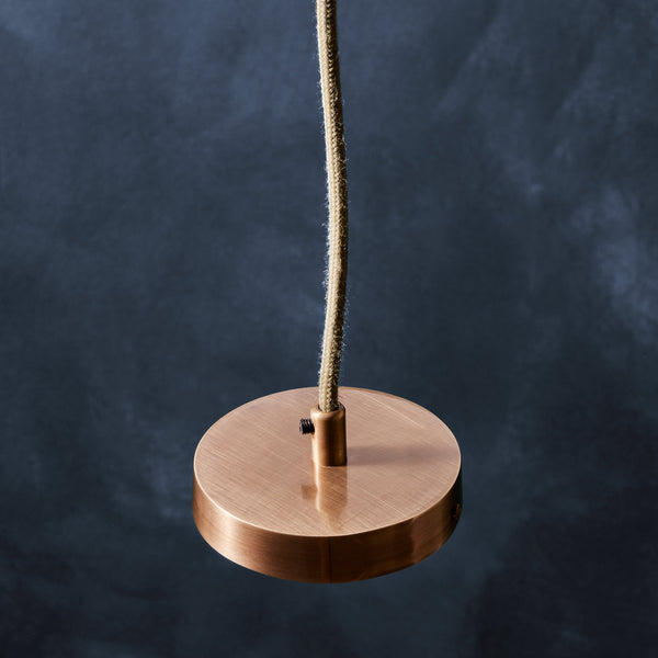 Bugatti pendant in antiqued brass