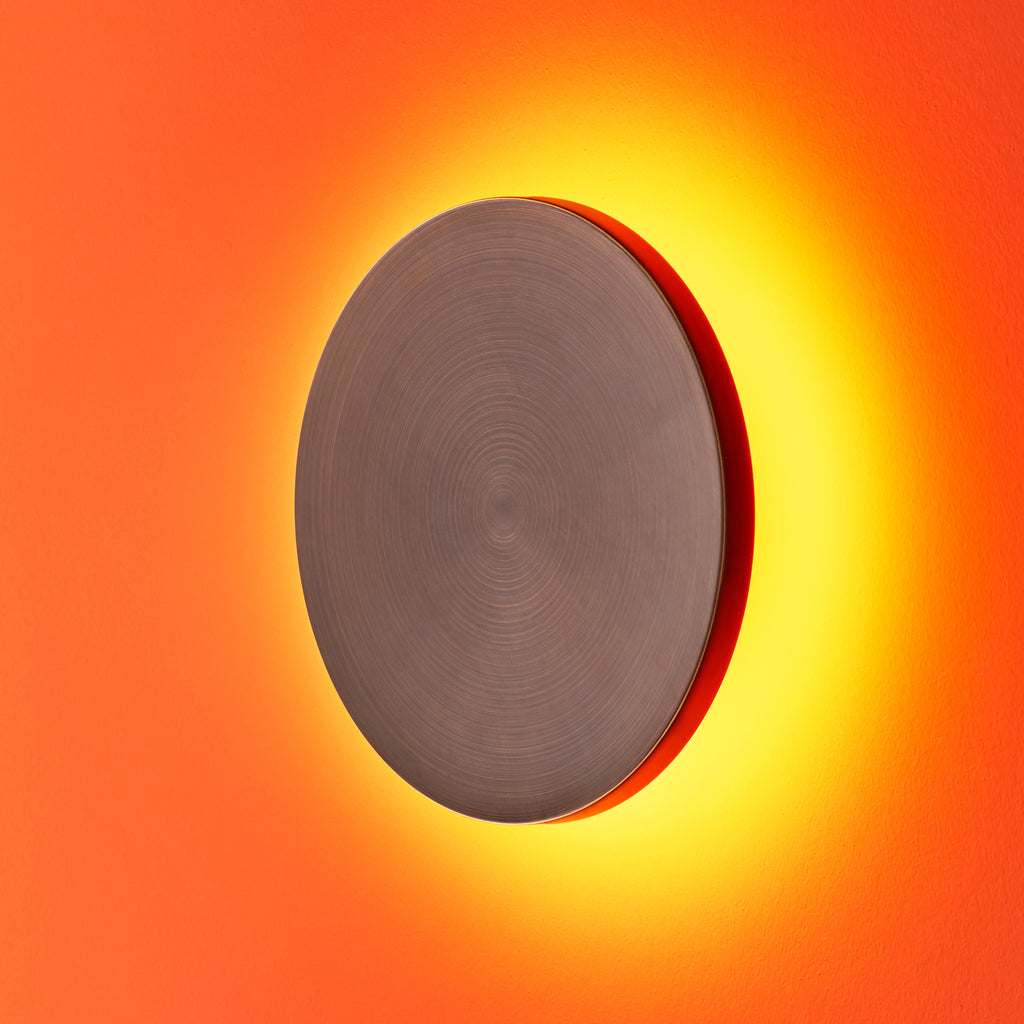 Larger Helios rechargeable wall light in bronze