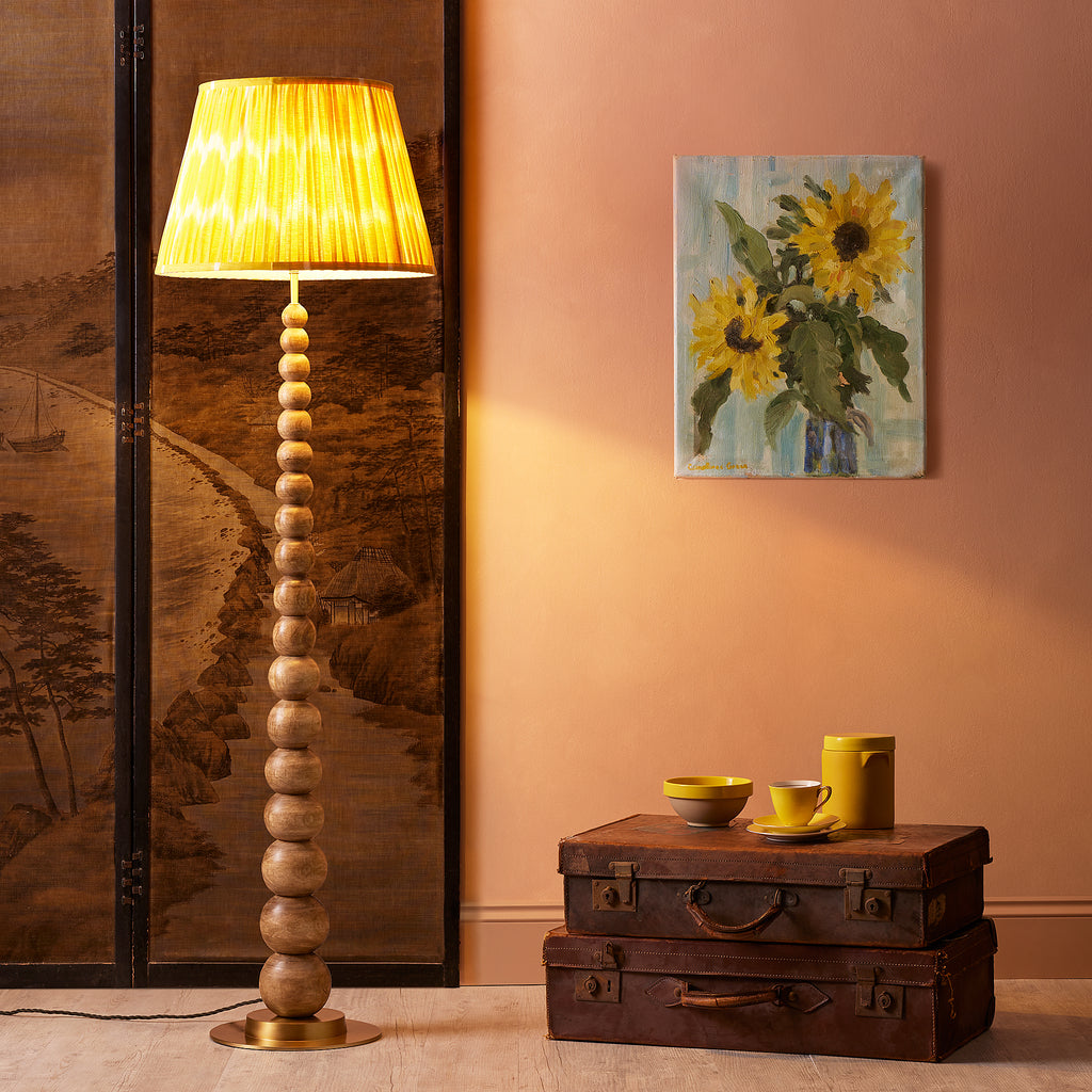 Rahul standing lamp in warm wood