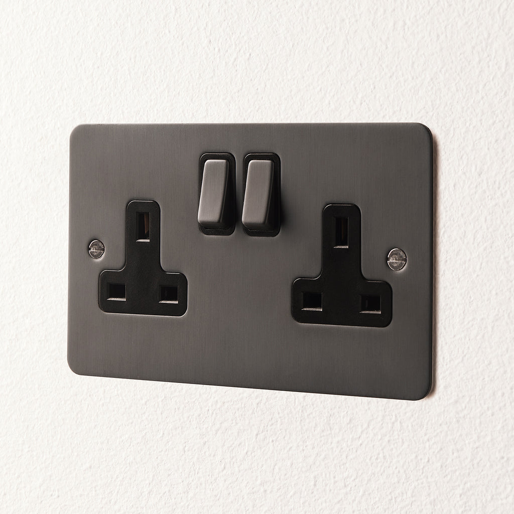 Lucian double socket with black inserts in bronze