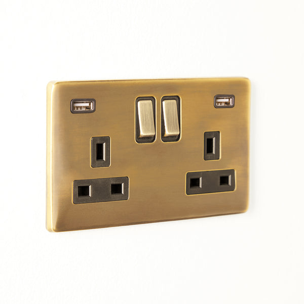 Florence two gang switched SP socket and dual USB outlet in brass