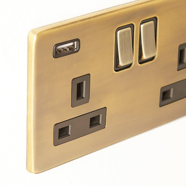 Florence two gang switched SP socket and dual USB outlet in brass