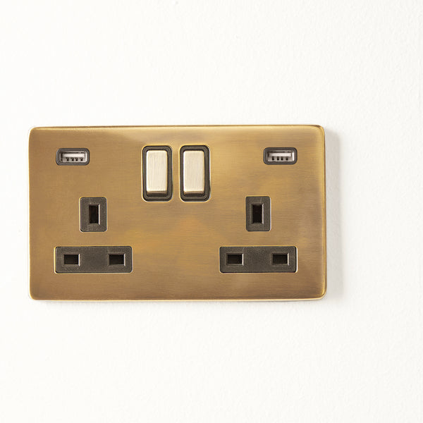 Florence two gang switched SP socket and dual USB outlet in brass