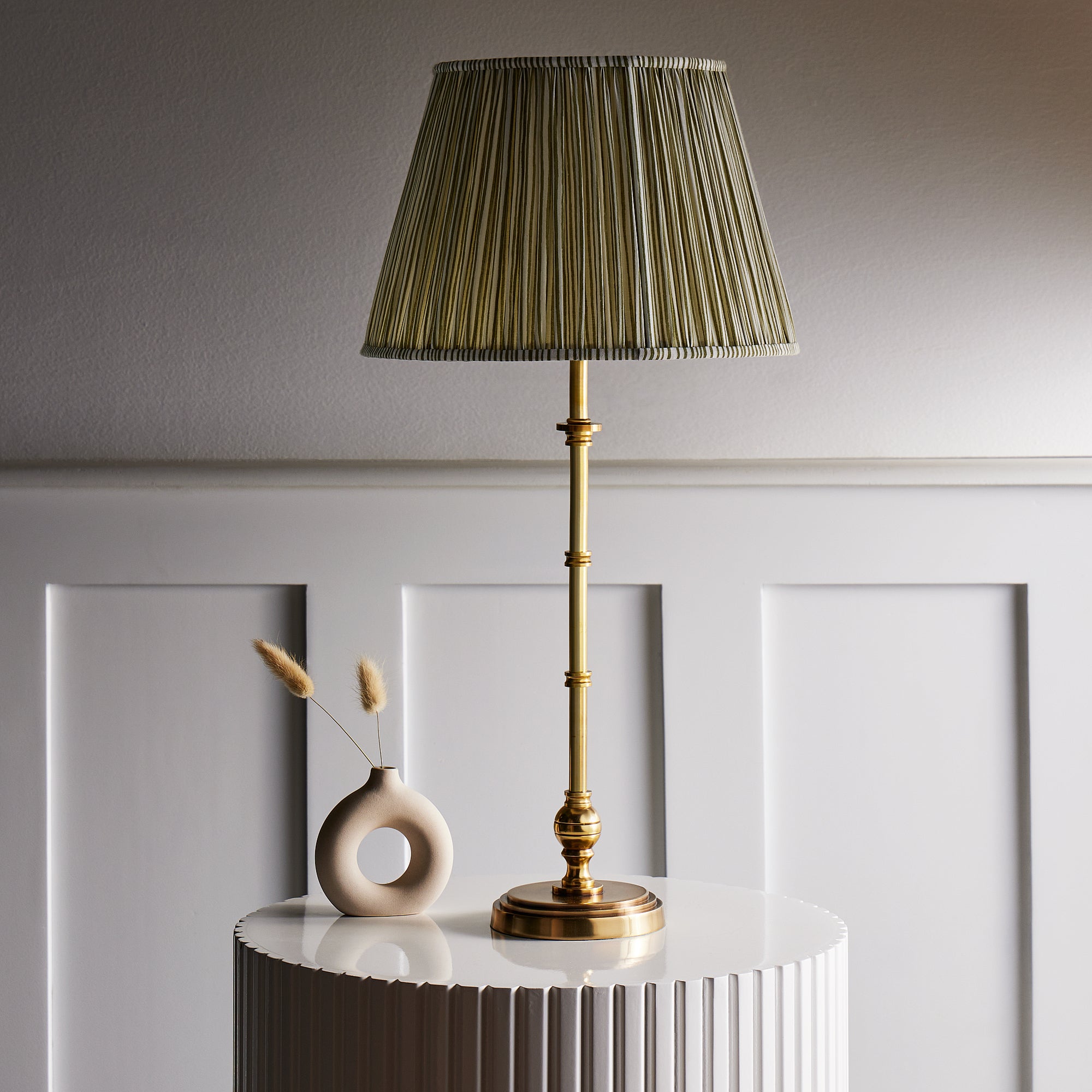 Chukka rechargeable table lamp in antique brass
