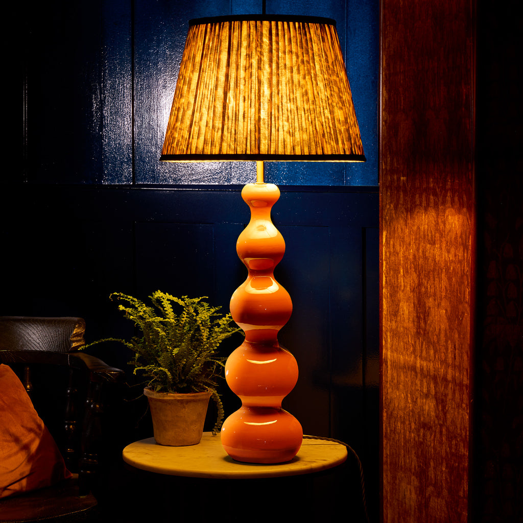 Larger Wobster table lamp in burnt orange lacquered wood