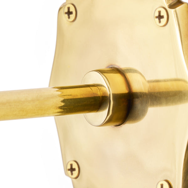 single insignia wall fitting in antique brass