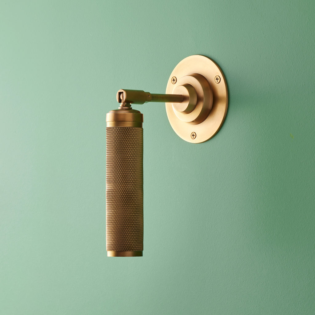 Quantum single wall light in antiqued brass