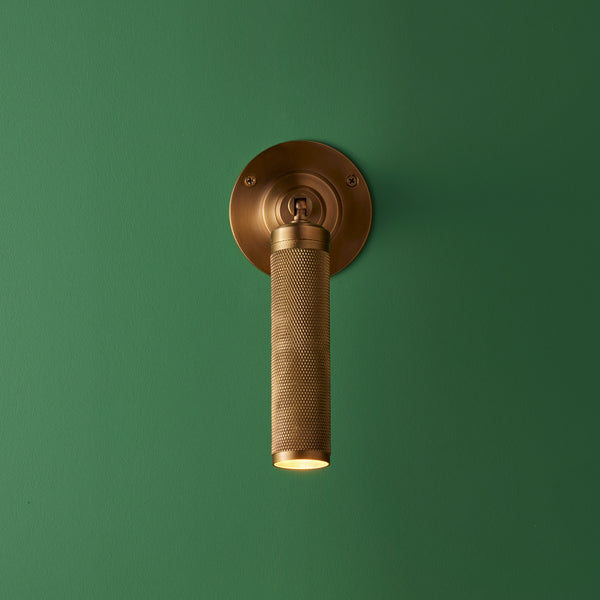 Quantum single wall light in antiqued brass
