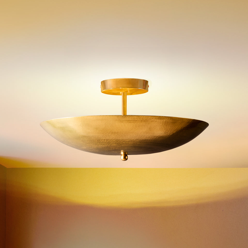 Reflect flush ceiling light in hammered brass