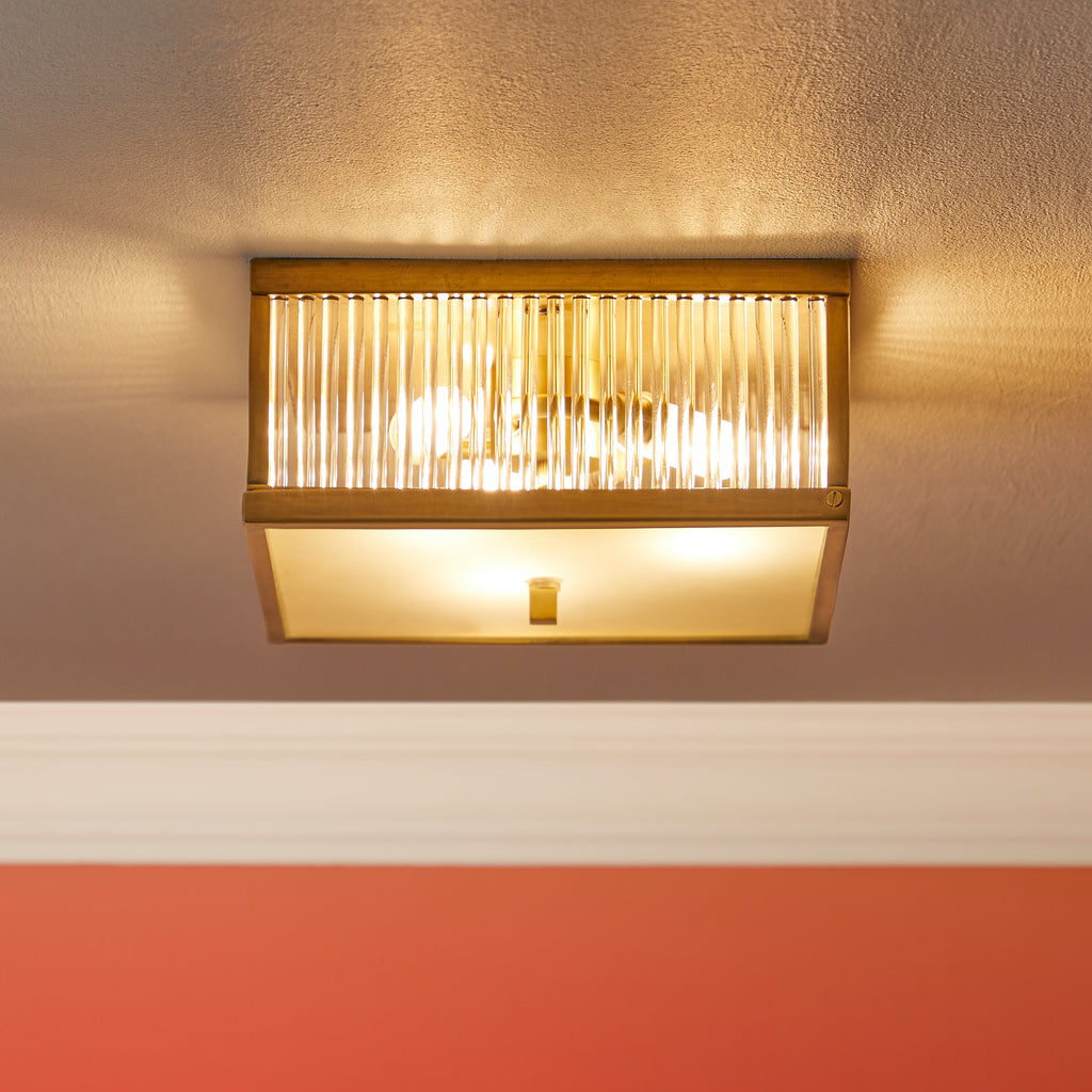 Square Roddy IP44 flush ceiling light in antique brass
