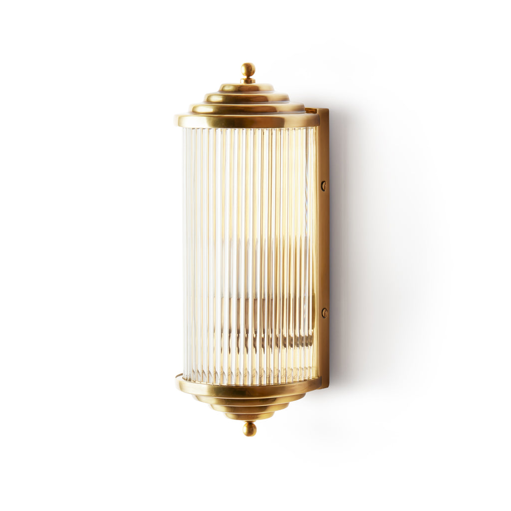 Deco Baby Roddy IP44 rated wall light in brass and glass