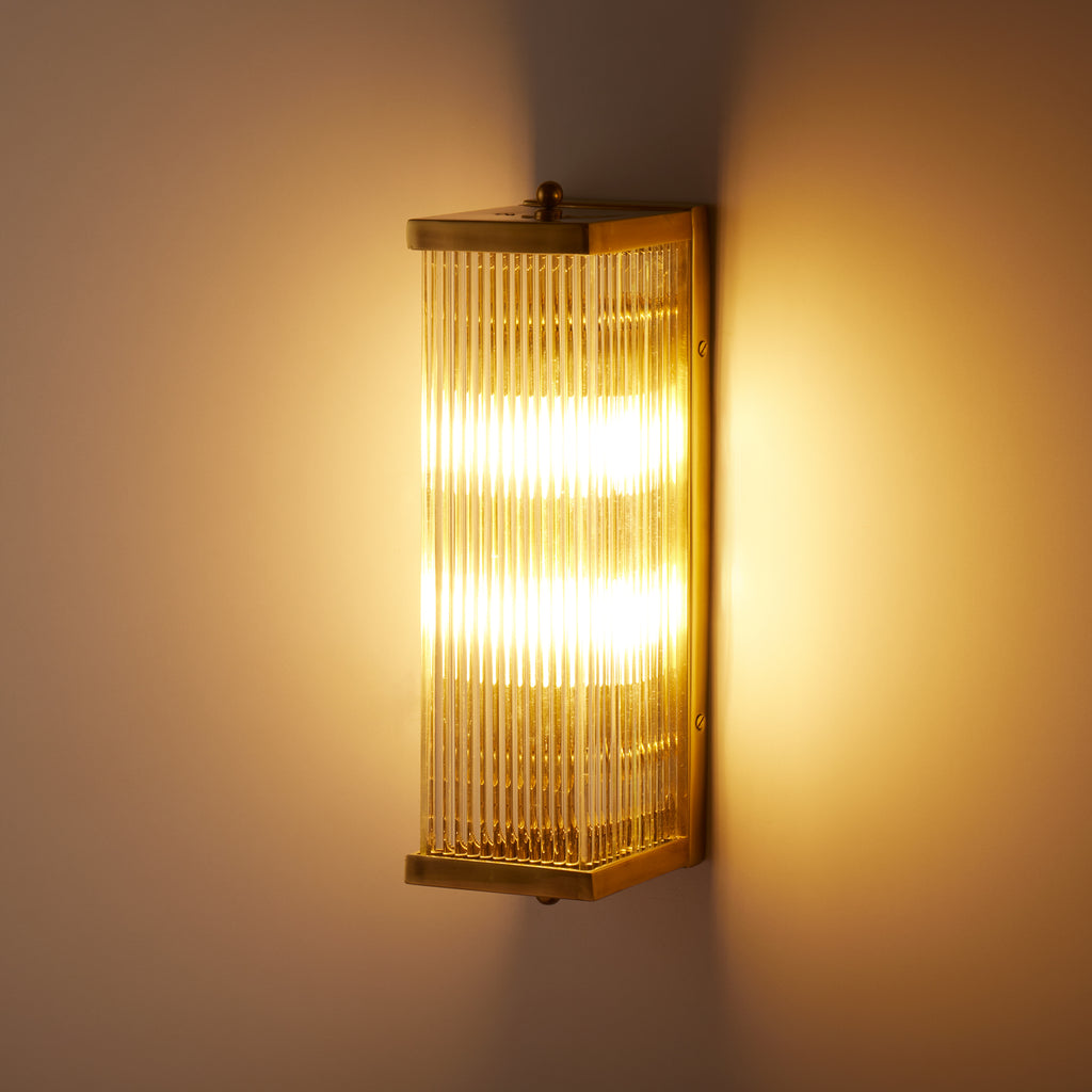 Rectangular Roddy IP44 rated wall light in brass and glass