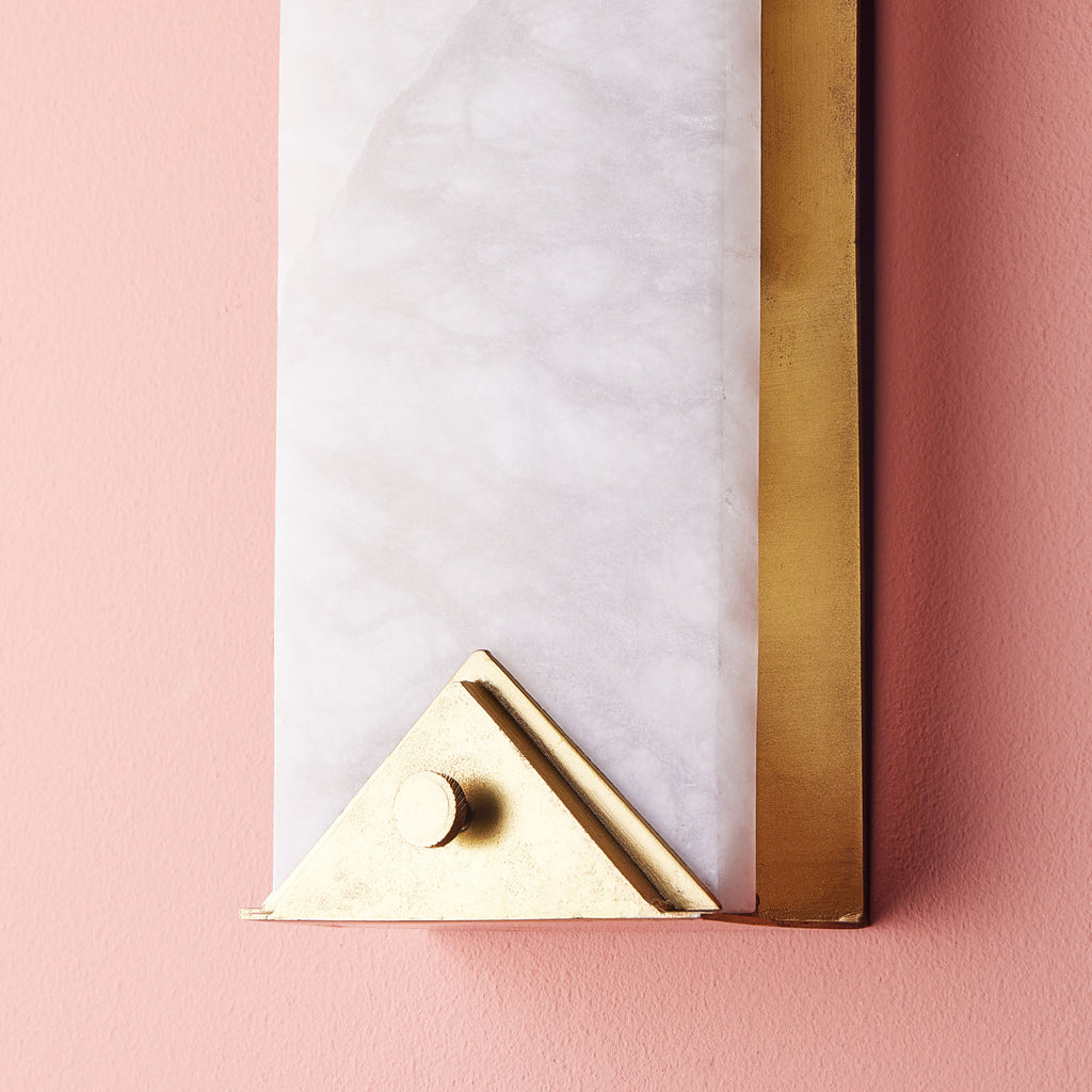 Theano wall light in alabaster and brass finish
