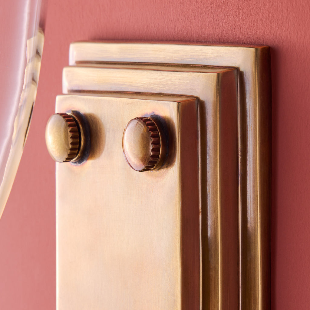 Waterloo wall light in antiqued brass