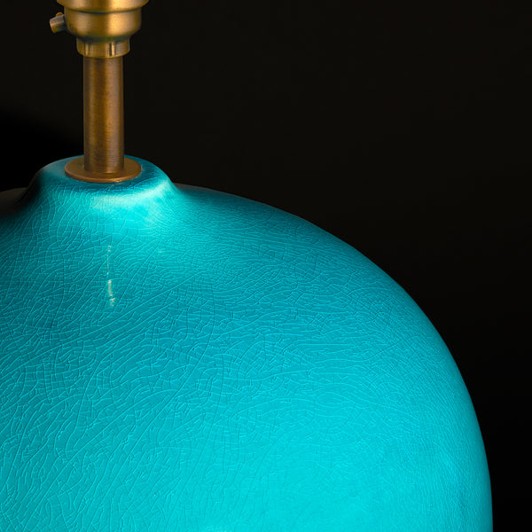 Olly table lamp in turquoise