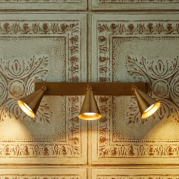 Crick triple spotlight in antiqued brass
