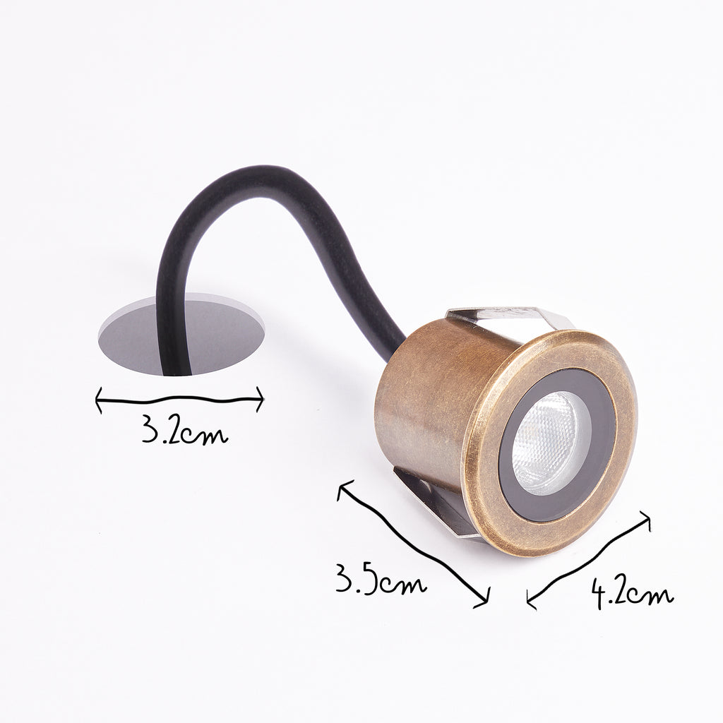 Minch IP67 LED deck light in antique brass