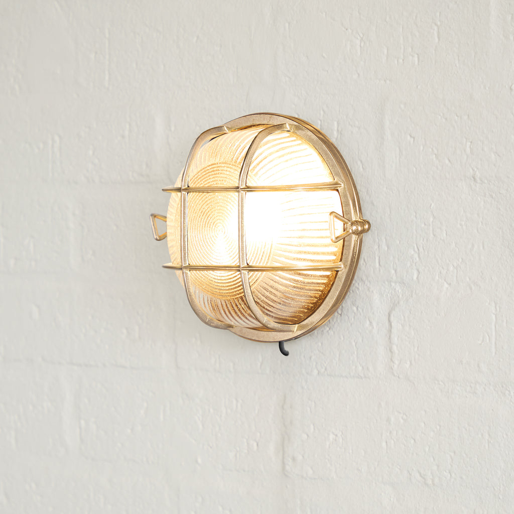 Vasco ip64 round bulkhead in unlacquered natural brass