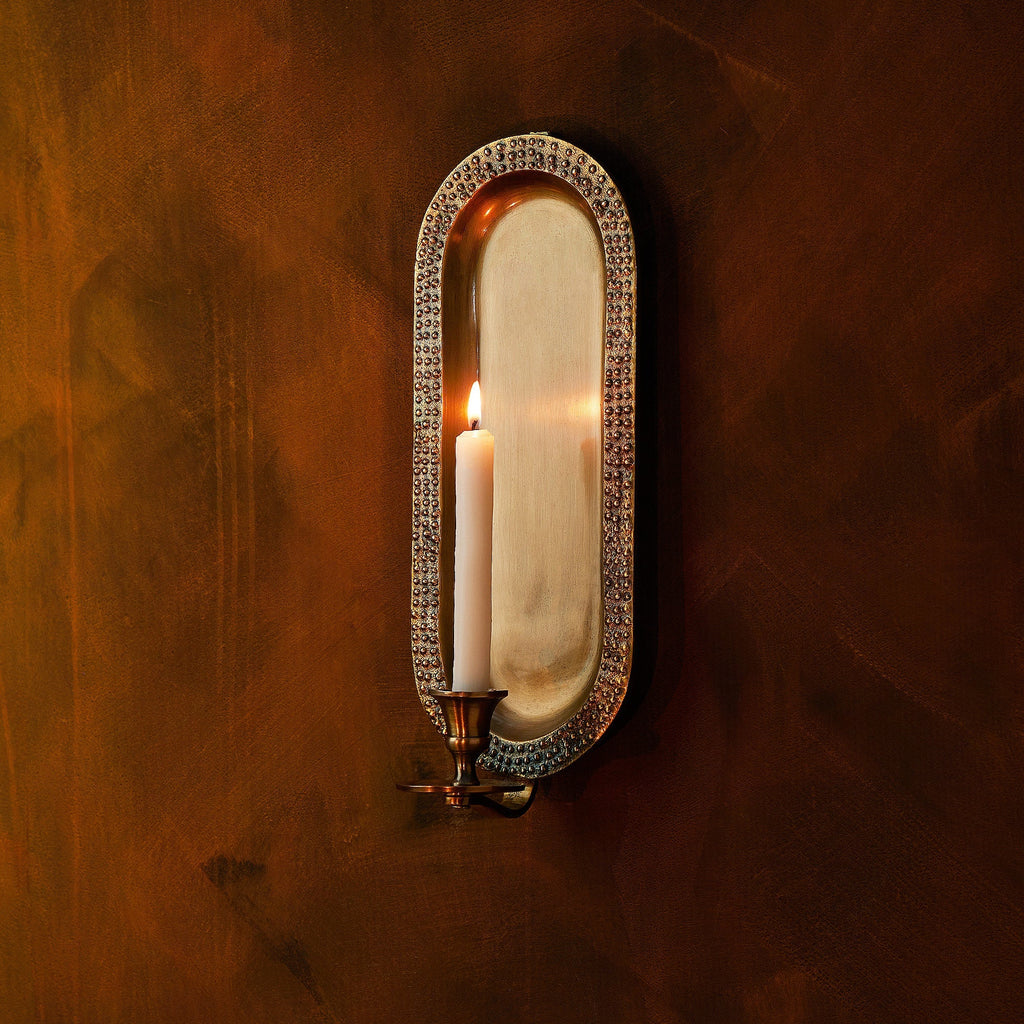 Beacon wall mounted candle holder in antiqued brass