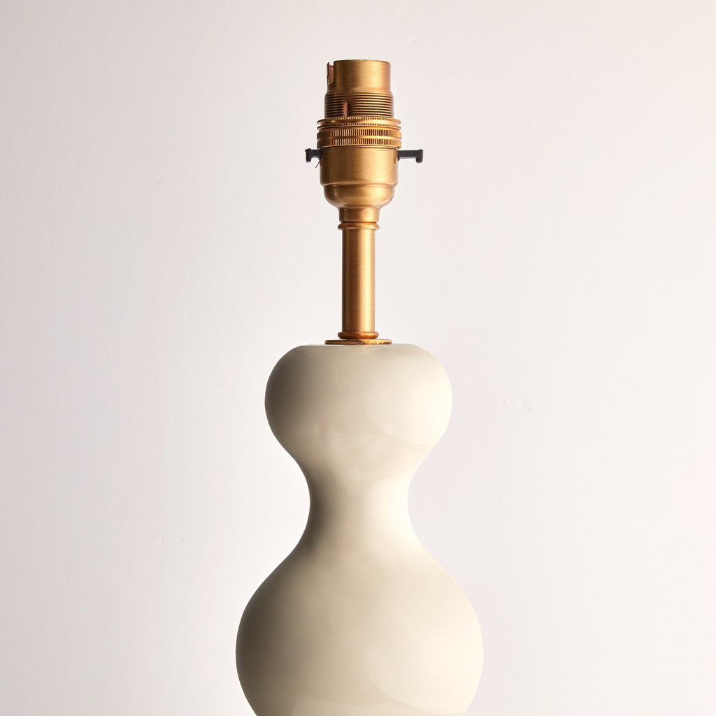 Smaller Wobster table lamp in white lacquered wood