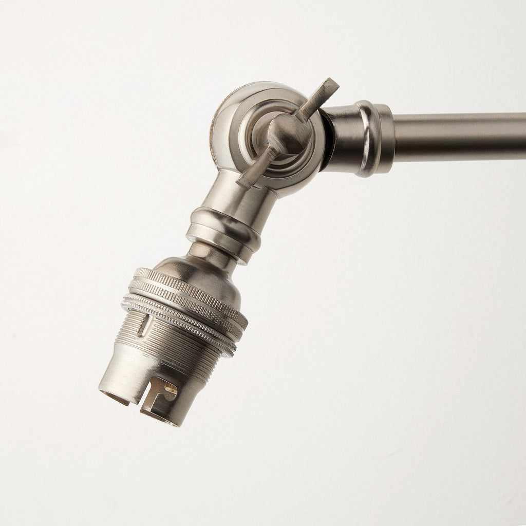 Double jointed wall fitting in antiqued silver