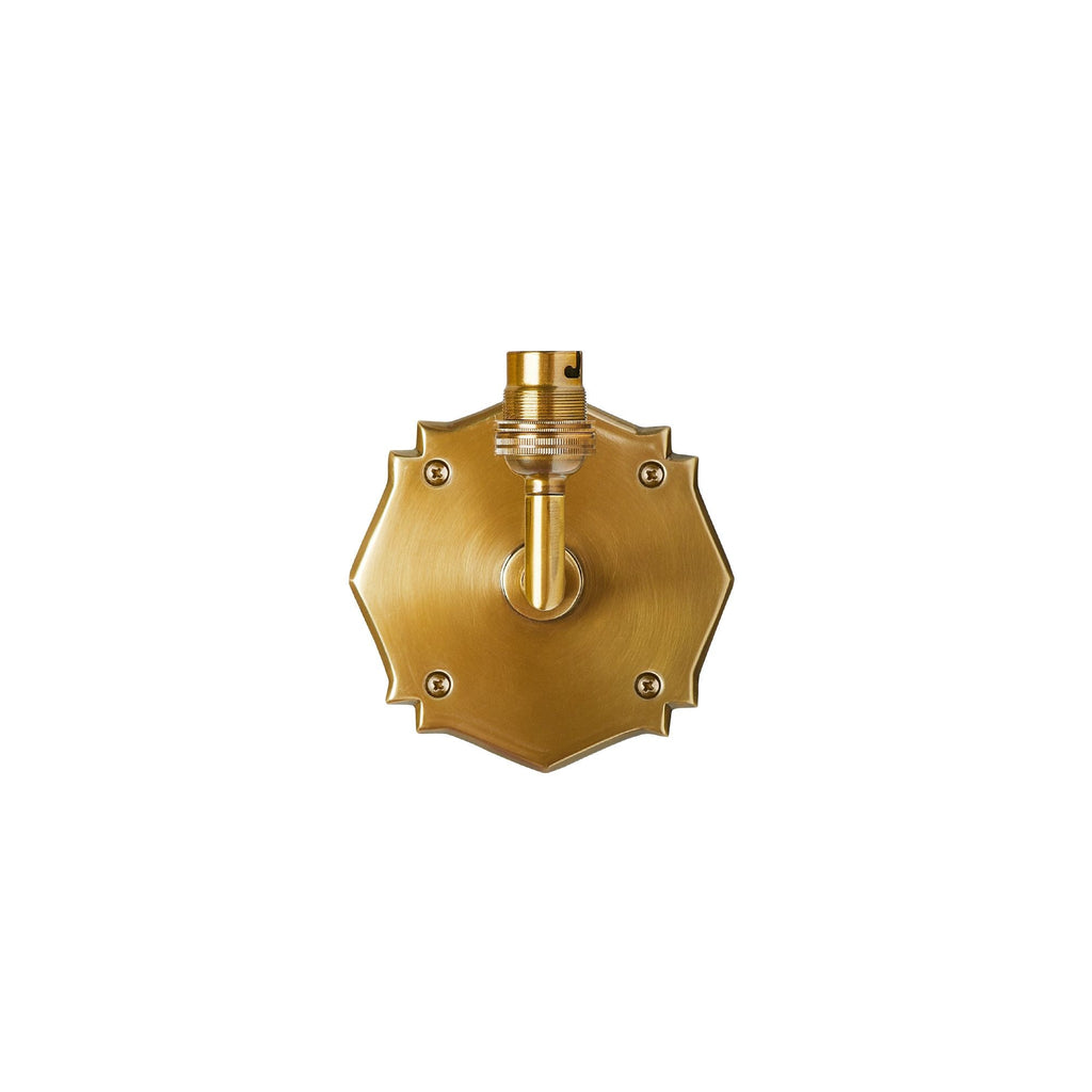 single insignia wall fitting in antique brass