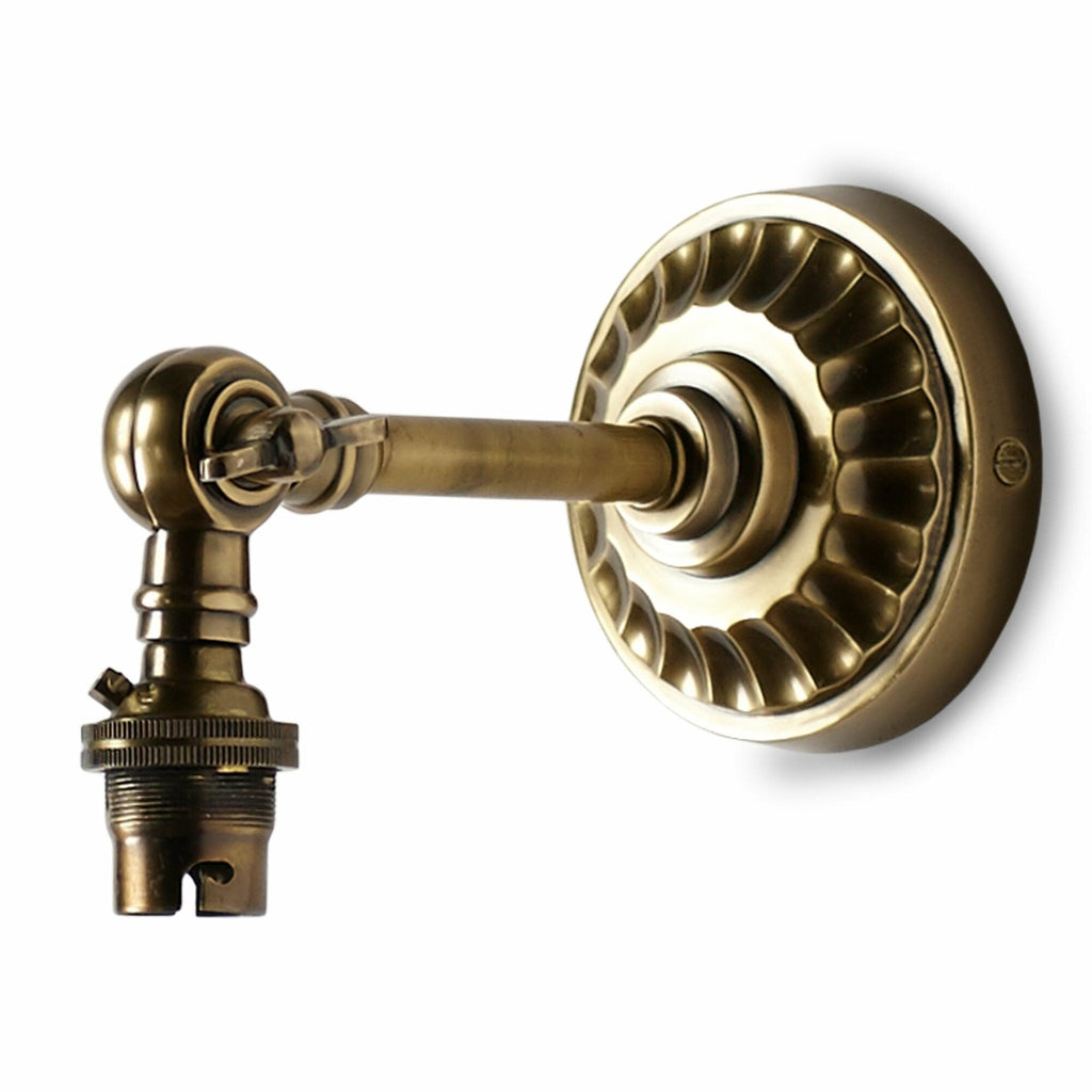 Rose Wall Fitting in Antiqued Brass: A Brass Flourish